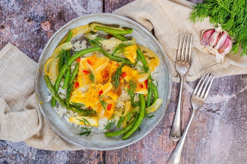 Ginger and turmeric cod stock photo. Image of dish, herb - 375053482