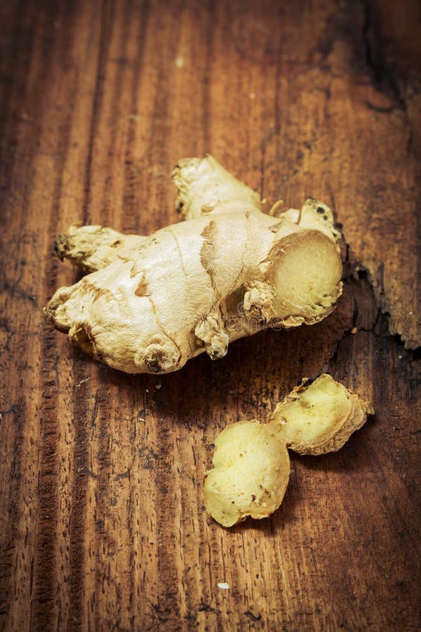 Ginger on wood table stock image. Image of ingredient - 39701111