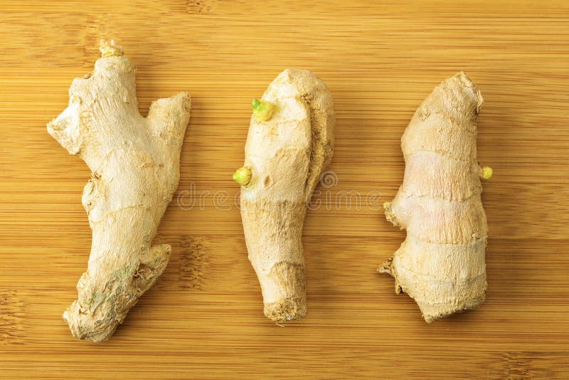 Ginger on wooden table stock photo. Image of organic - 32423748