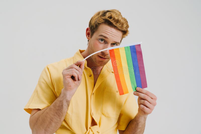 Ginger Young Man Looking at Camera and Posing with Rainbow Flag Stock ...