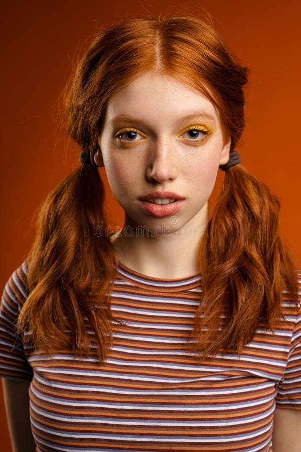 Multiracial Two Women Laughing while Looking at Camera Stock Photo ...