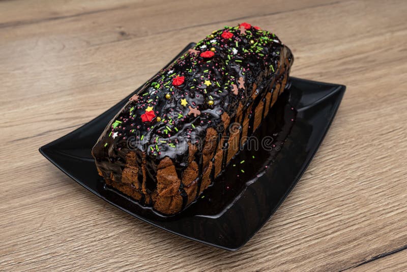 Gingerbread Cake with Chocolate Icing and Jam Inside, Sprinkled with ...