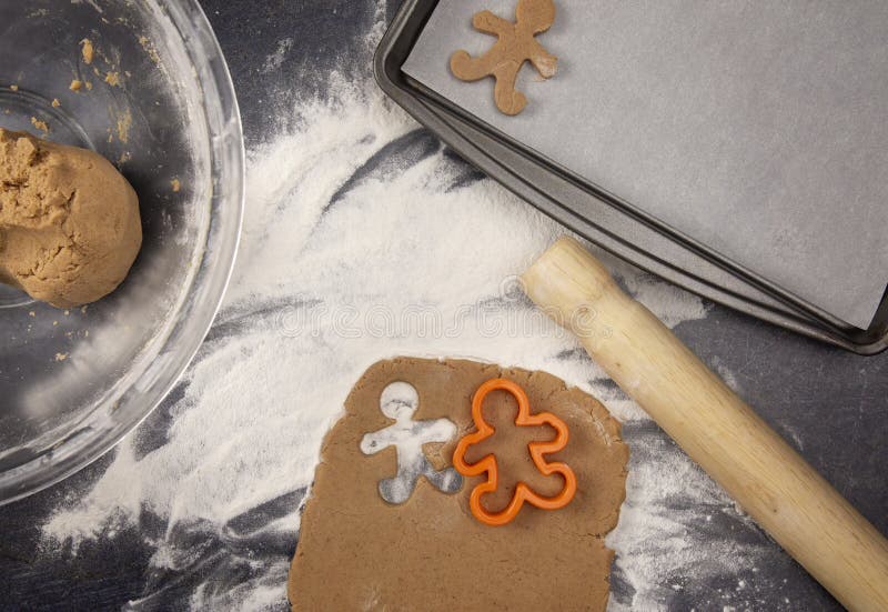 Gingerbread Cookies Being Rolled Out and Cut Stock Photo - Image of ...