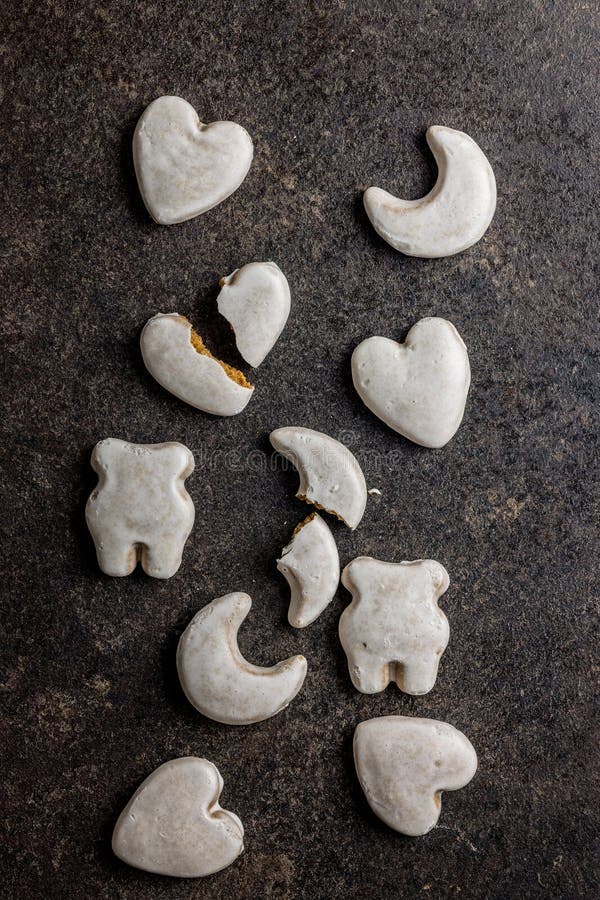 Gingerbread Cookies with the Sugar Icing on Black Table. Top View Stock ...