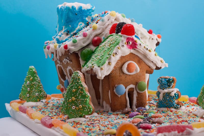 Gingerbread House Isolated on Blue Stock Photo - Image of isolated ...