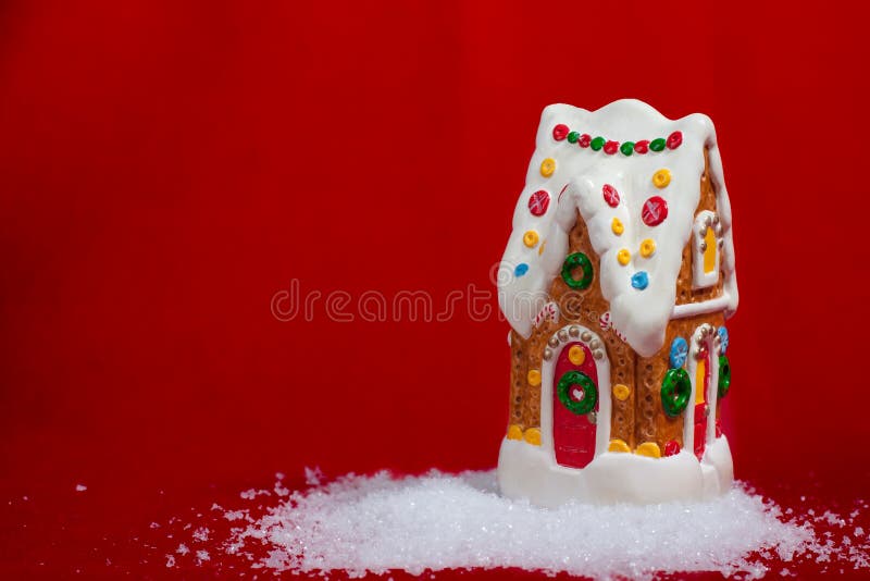 Gingerbread House in Snow on Red Background Stock Photo - Image of ...