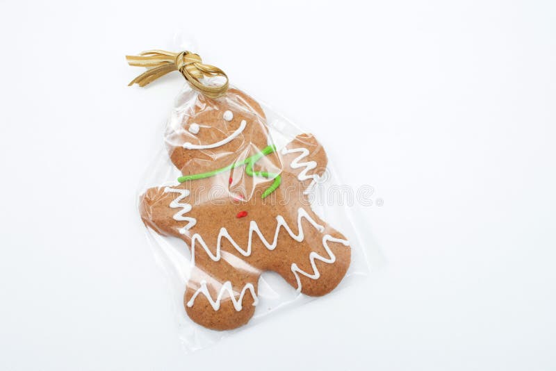 Gingerbread Man Cookie in a Gift Bag on White Stock Photo - Image of ...