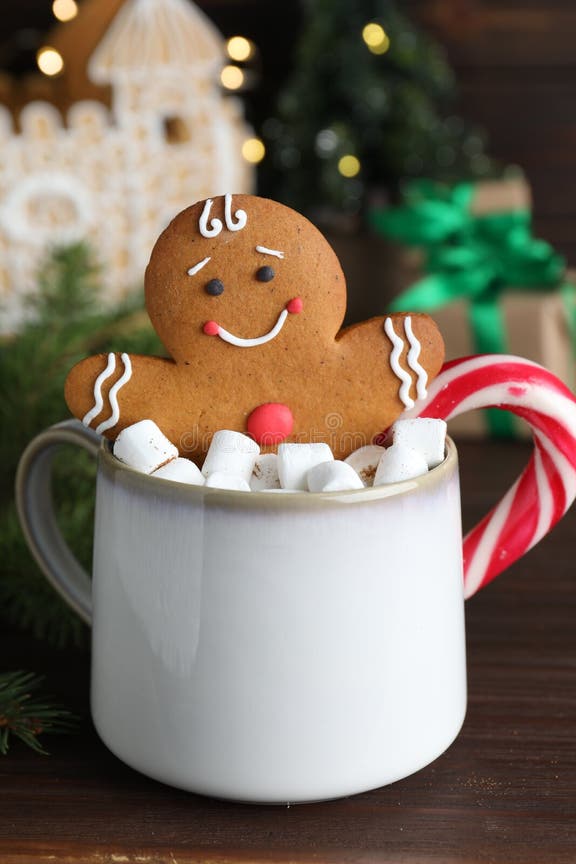 Gingerbread Man in Cup on Wooden Table, Closeup Stock Image - Image of ...
