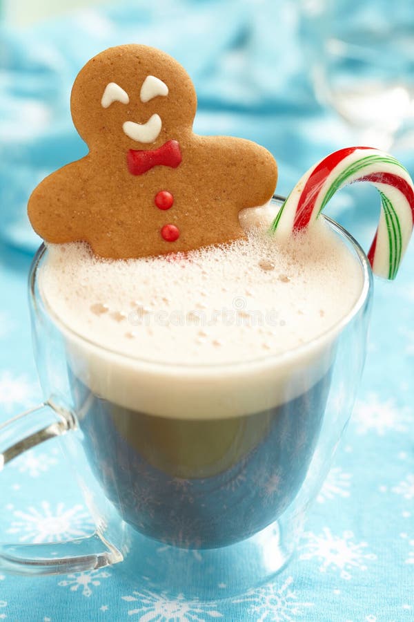 Gingerbread Man in Hot Chocolate Stock Photo - Image of blue, beverage ...