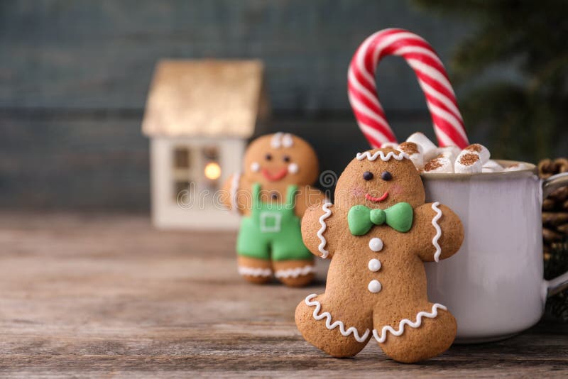 Gingerbread Man and Hot Drink on Wooden Table, Space for Text Stock ...