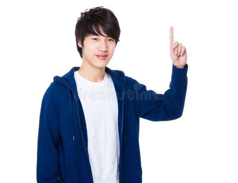 Giovane che mostra dito su fotografia stock. Immagine di maschio - 61087032