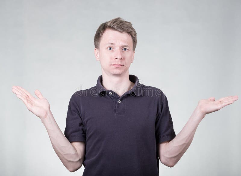 Giovane dubbioso fotografia stock. Immagine di espressione - 72714906