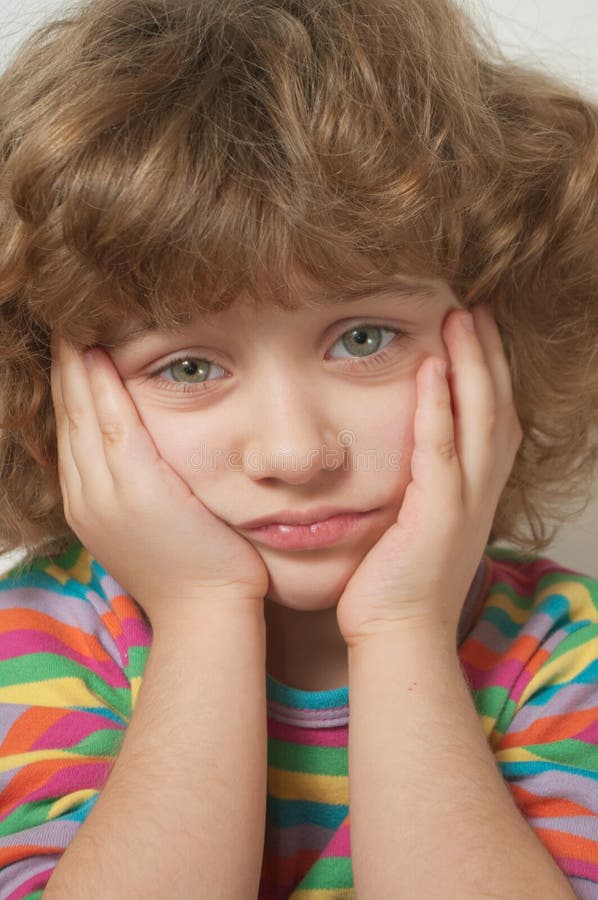 Sulky Little Girl with Head in Hands Stock Photo - Image of miffed ...