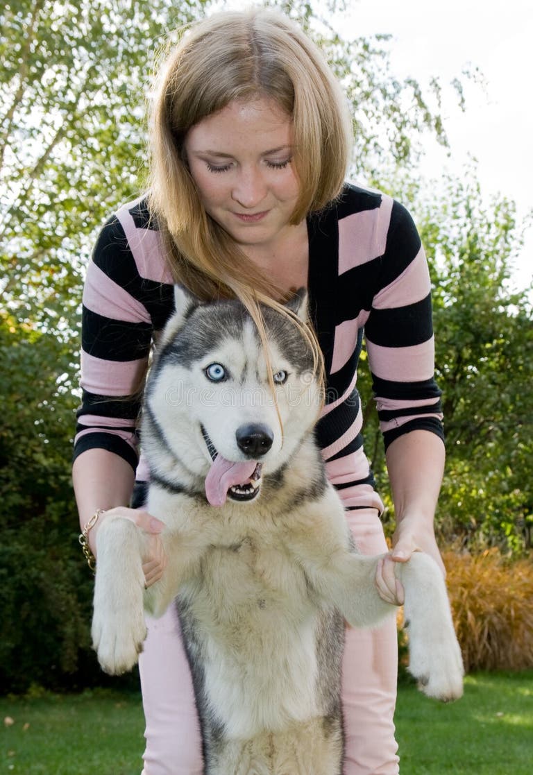 Cute Wolf Girl Looking Her Pet Stock Photos - Free & Royalty-Free Stock ...