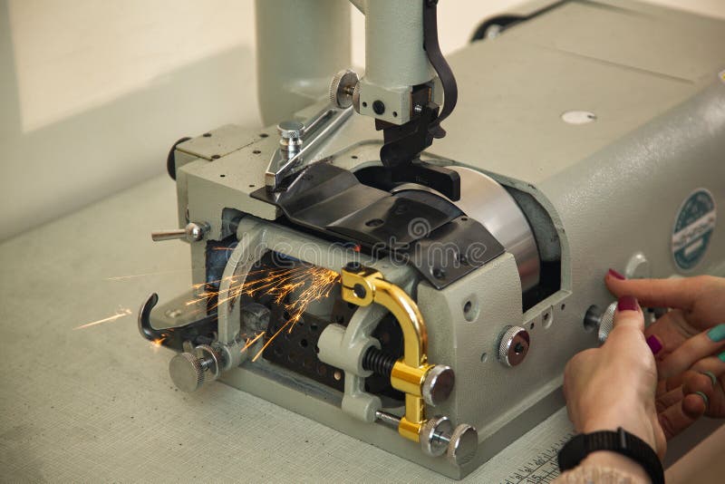 The Girl Adjusts the Sharpening of a Knife in a Lathe Stock Image ...