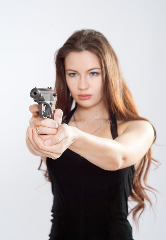 Girl aiming a gun stock photo. Image of glamour, aiming - 22766724