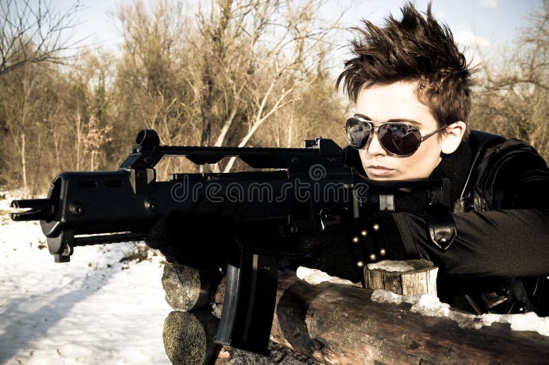 Girl aiming a machine gun stock photo. Image of caucasian - 17423390