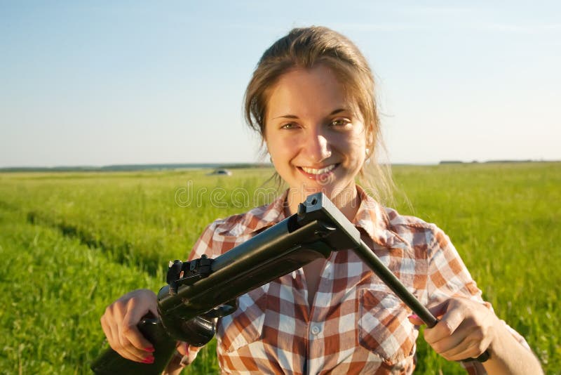 Girl with air rifle stock image. Image of beauty, girl - 15219629