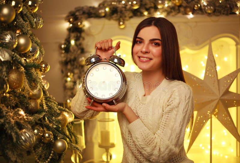 Girl with Alarm Clock at Home in Christmas Decorations Stock Image ...