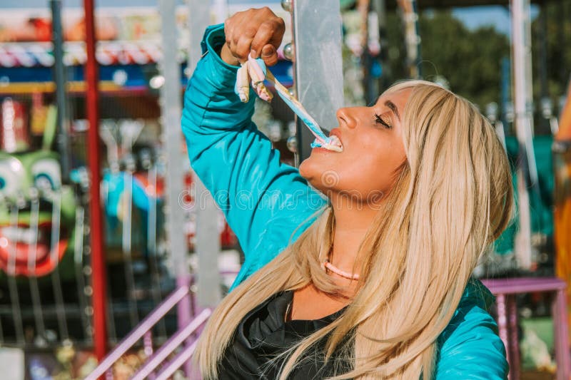 Girl in the amusement park stock photo. Image of woman - 330525744