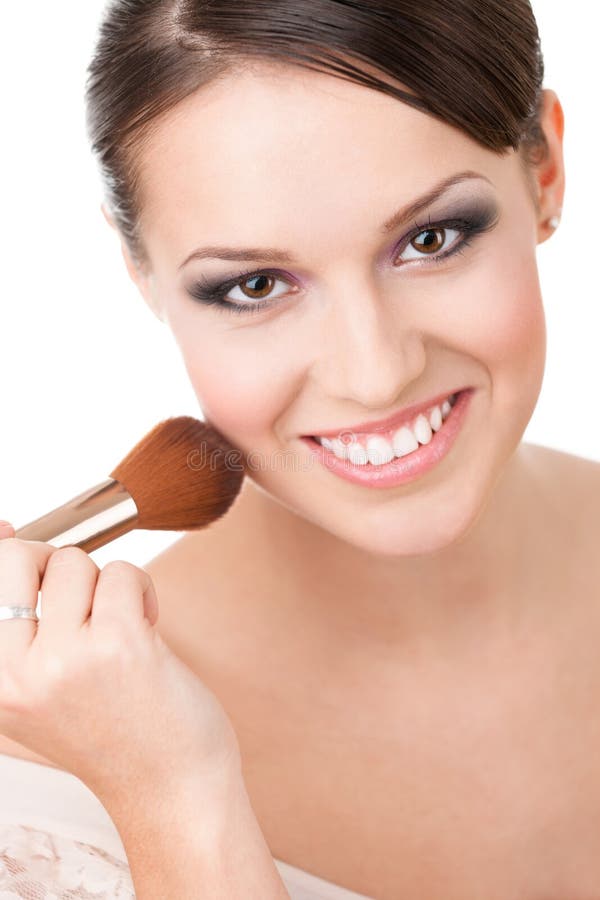 Girl Applying Cosmetics To Her Face Stock Photo - Image of brown ...