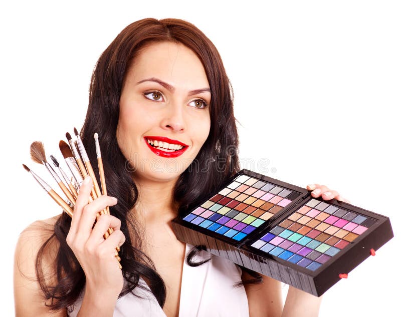 Girl applying makeup. stock photo. Image of woman, isolated - 25078318