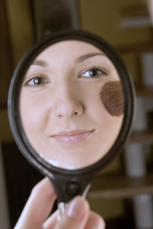 Girl applying makeup stock image. Image of powder, adult - 38137825