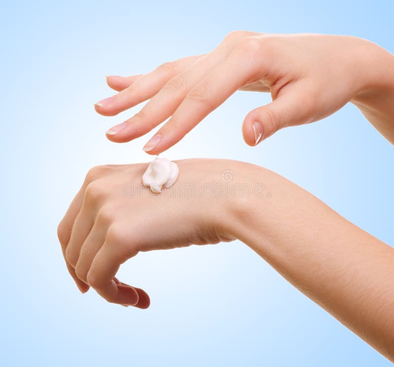Girl Applying Some White Lotion on Her Hand Stock Photo - Image of ...