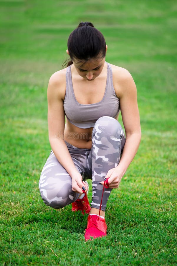 Girl Tying Shoes Stock Photos - Download 3,214 Royalty Free Photos