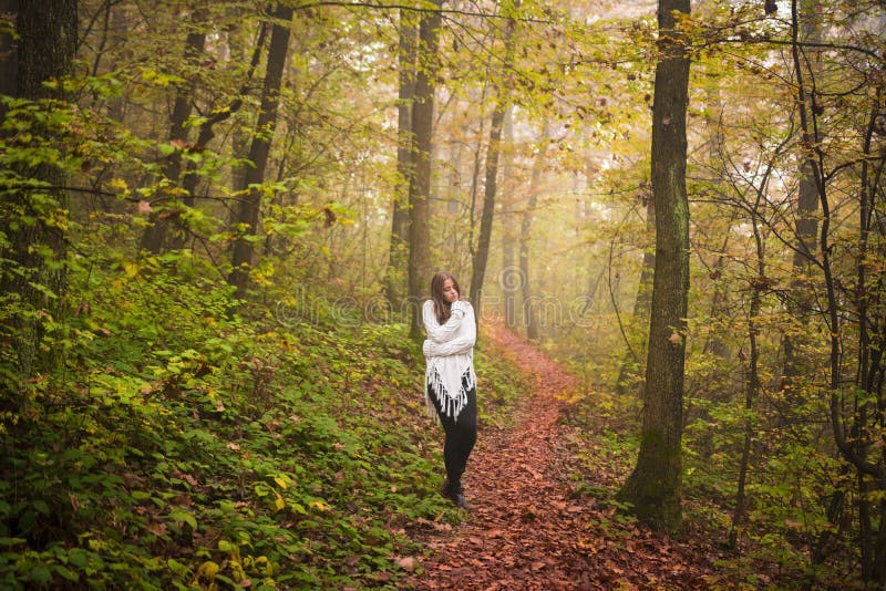 Girl and autumn stock image. Image of path, yellow, face - 79492387