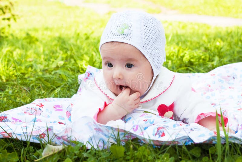 Girl Baby a Rattle Played Outdoors Stock Photo - Image of flower ...