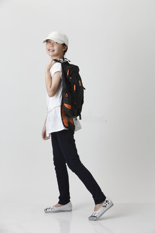 Girl with back pack stock photo. Image of looking, isolated - 48523058