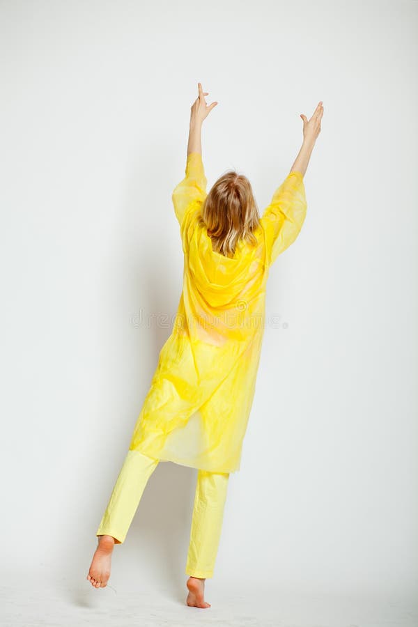 Girl back in yellow stock photo. Image of person, stretch - 52913982