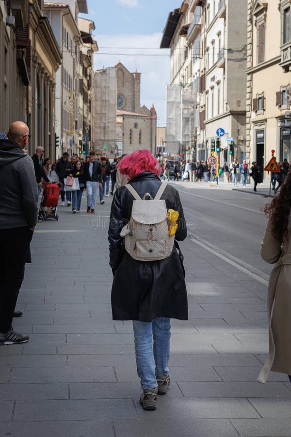 Girl with Backpack Walking Along the Streets of Florence, Italy ...