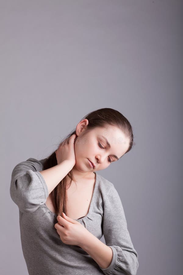 Girl with a bad neck stock image. Image of girl, color - 18231349