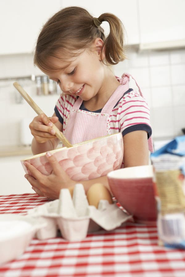 Girl Baking in Kitchen stock photo. Image of kitchen - 55897086