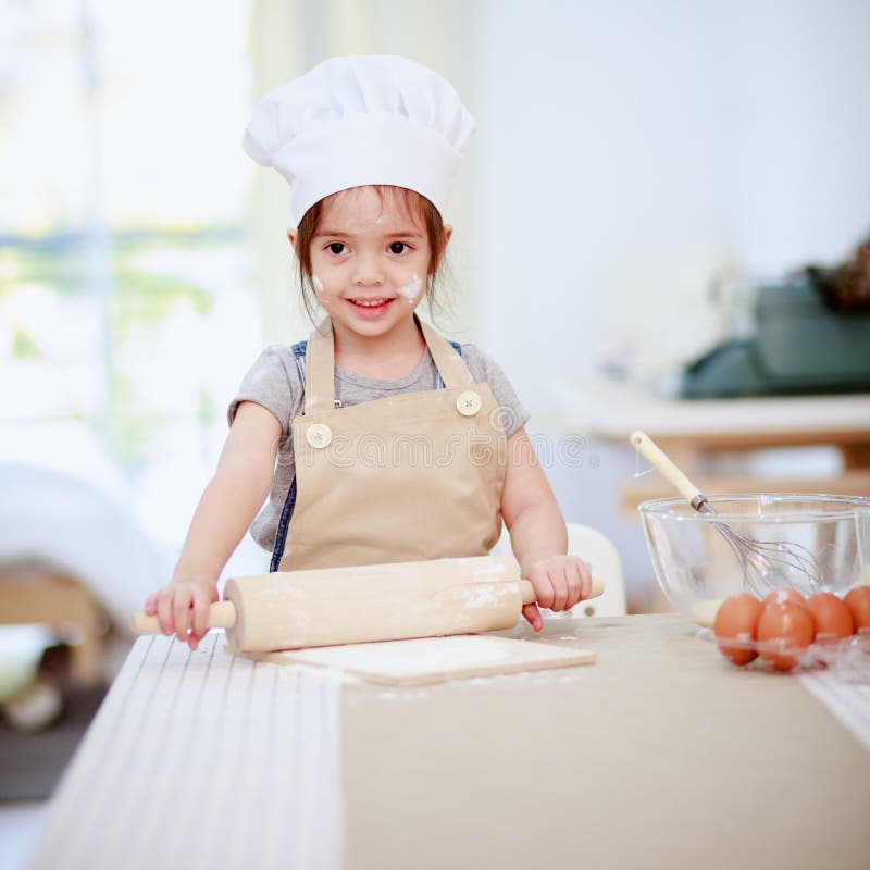 Girl Baking and Mixing stock image. Image of dress, food - 109334371