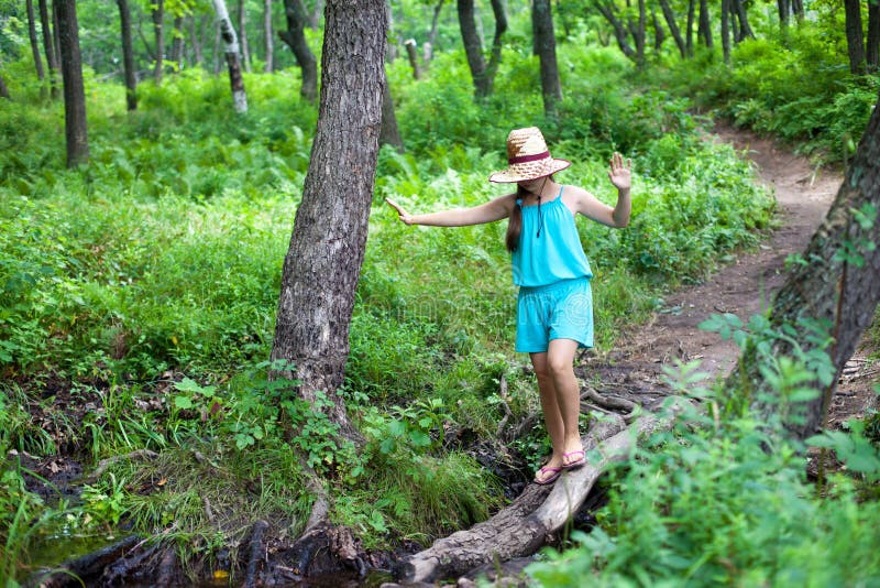 Girl balancing on a log stock photo. Image of tree, child - 39286050
