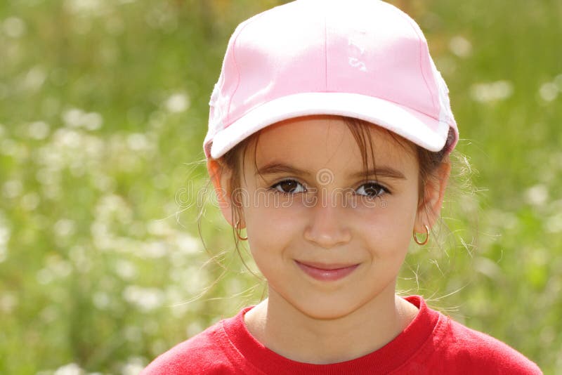 Girl in a Baseball Cap stock image. Image of sunshine - 2879211