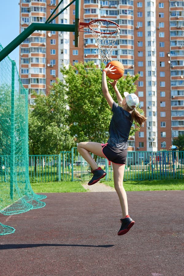 Girl Basketball Player Throws Ball in Basket Stock Image - Image of ...
