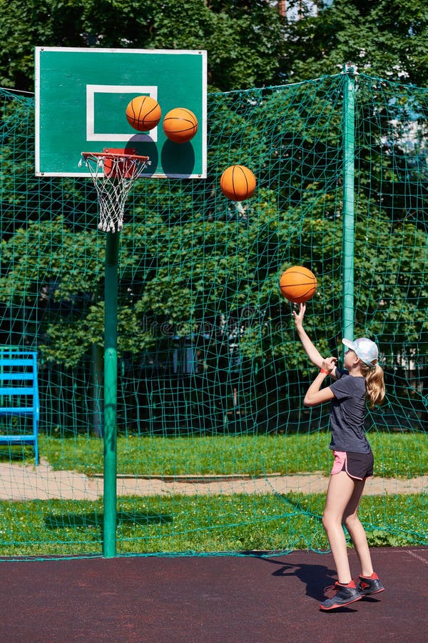 Girl Basketball Player Throws Ball in Basket Stock Image - Image of ...