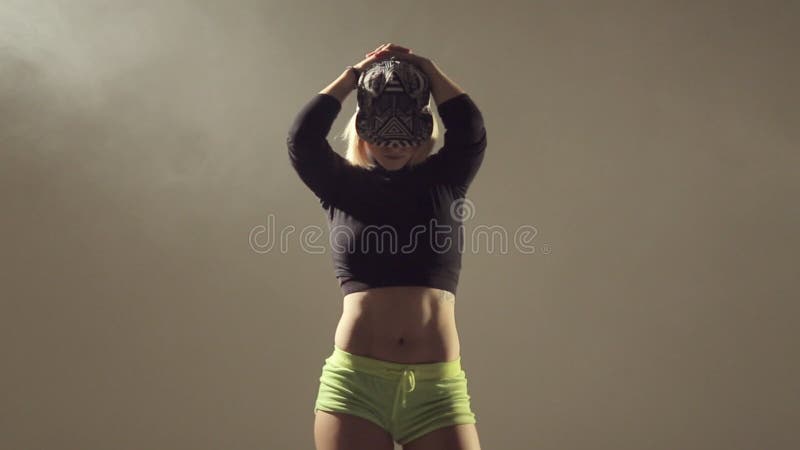 Girl with Beautiful Physique Moves in a Studio in Stock Footage - Video ...