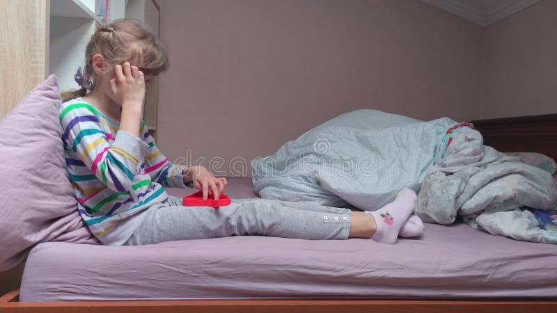 Girl on the Bed with Fidget Toy Stock Video - Video of psychology ...