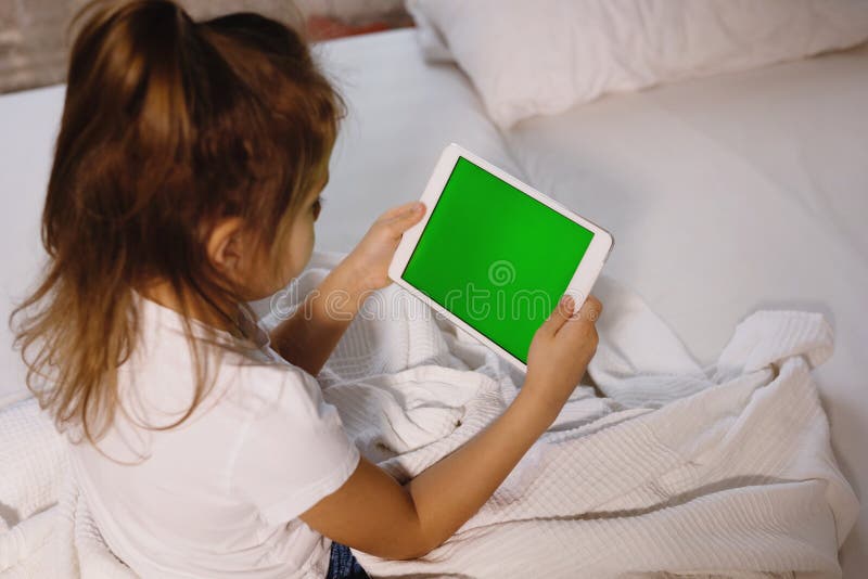 A Girl Behind the Phone with a Green Screen Stock Photo - Image of chat ...