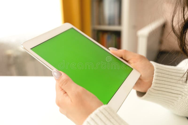 A Girl Behind the Phone with a Green Screen Stock Photo - Image of ...