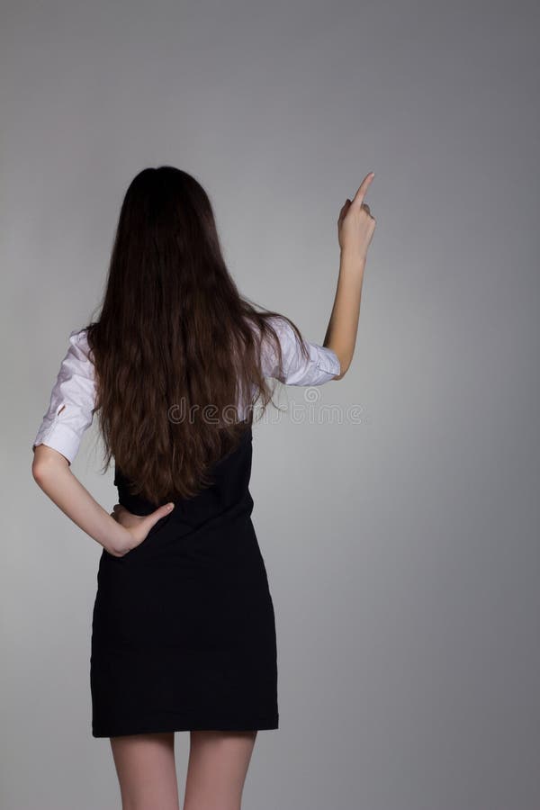 Girl from Behind Shows Something Stock Image - Image of beauty, hand ...