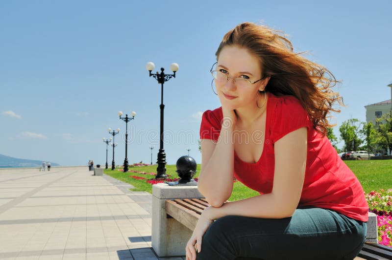 Girl on bench stock photo. Image of city, female, young - 14831294