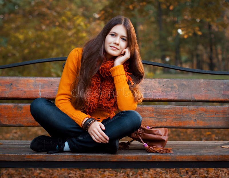 Girl on Bench in Autumn Park Stock Image - Image of person, leaf: 35036277