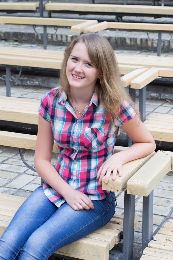 Girl on a bench stock image. Image of smiling, lifestyle - 44192401