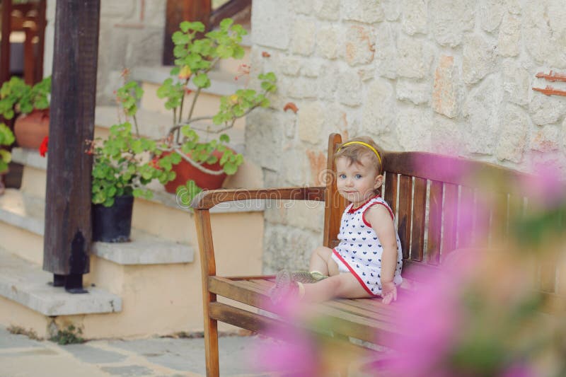 Girl on Bench stock image. Image of childhood, nature - 43012629